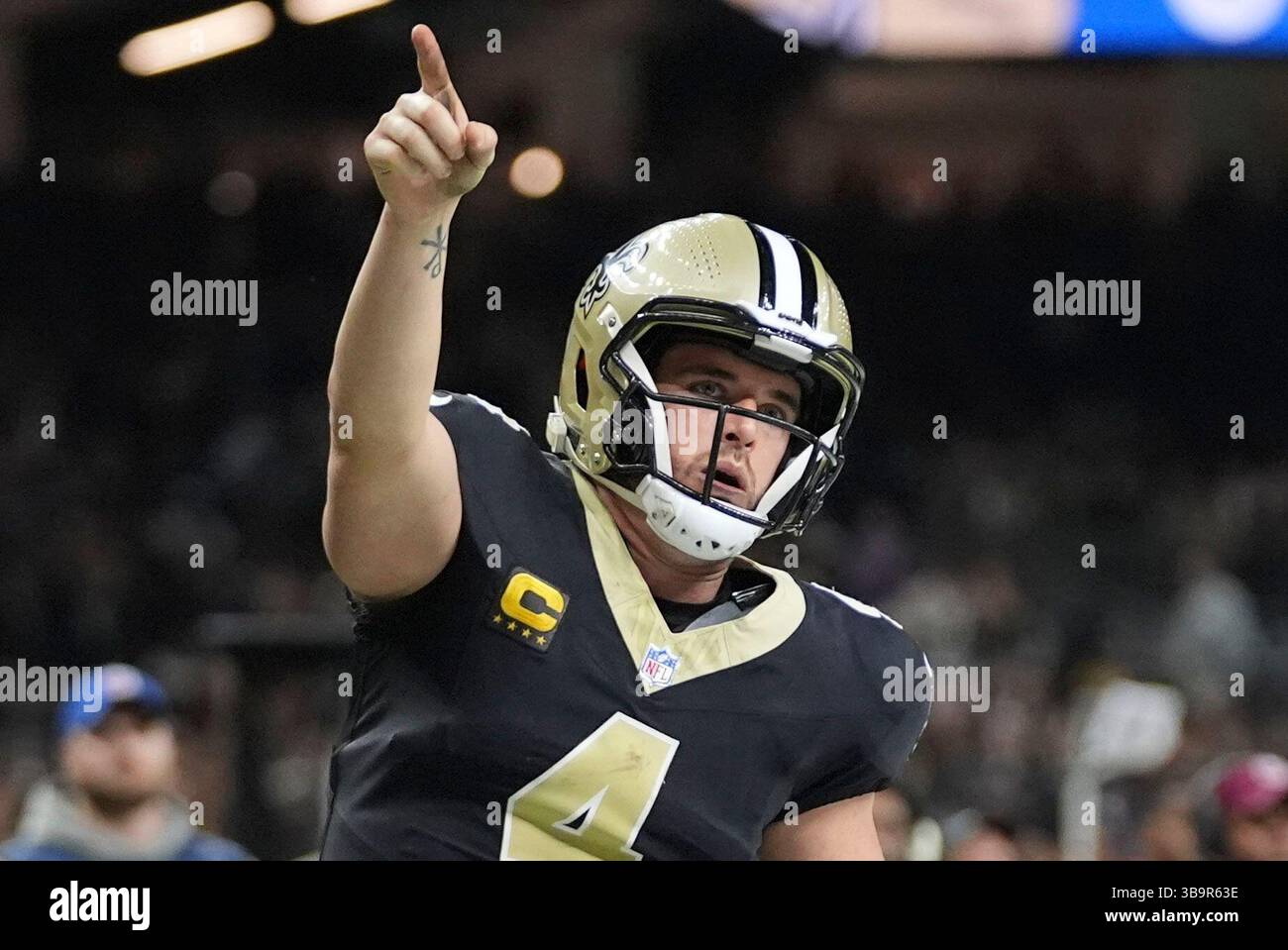 FILE - New Orleans Saints quarterback Derek Carr (4) reacts after his ...