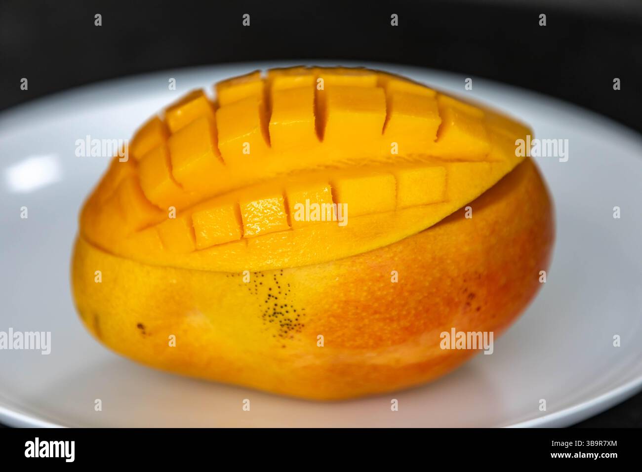 Ripe rosa mango isolated on uniform background. Brazilian fruit and ...
