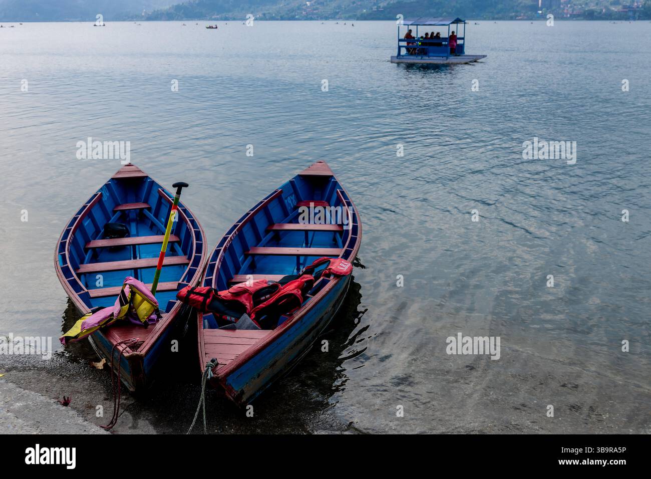 Boats on Phewa lake, Fewa lake in Nepal. Colorful boats attraction and ...