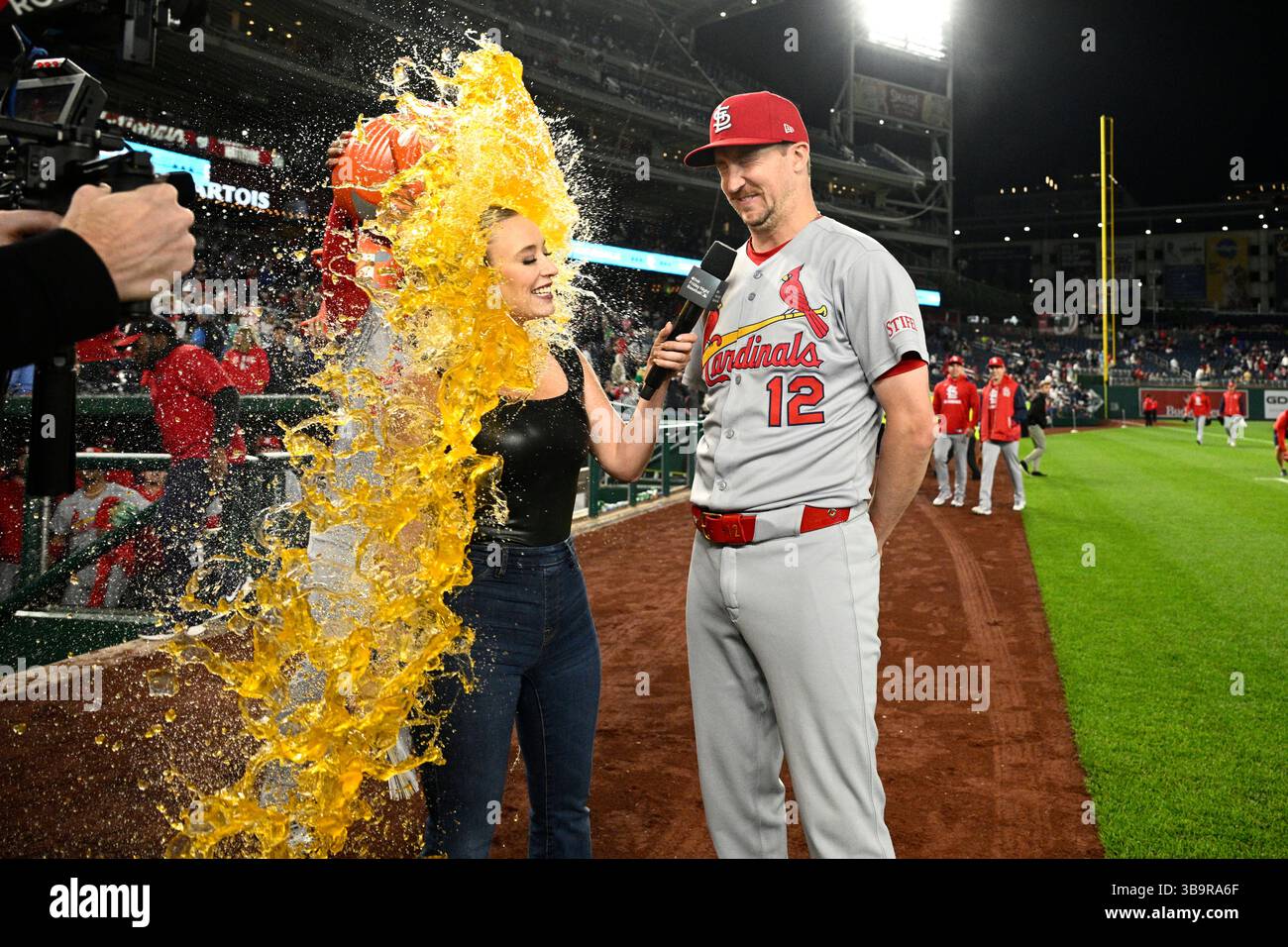 St. Louis Cardinals starting pitcher Erick Fedde gets doused after a ...