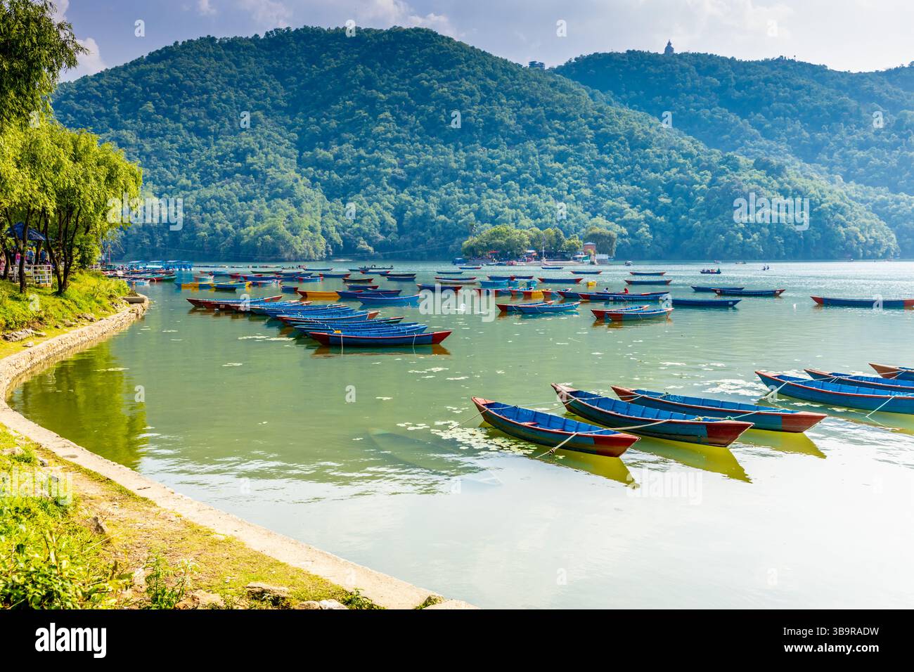 Boats on Phewa lake, Fewa lake in Nepal. Colorful boats attraction and ...