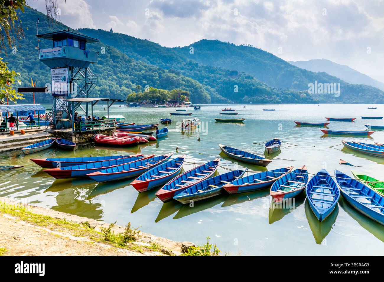 Boats on Phewa lake, Fewa lake in Nepal. Colorful boats attraction and ...