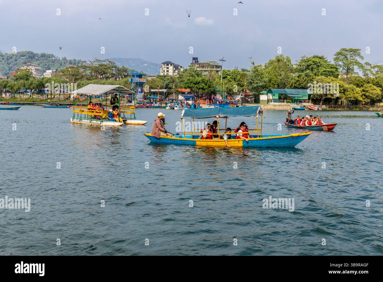 Boats on Phewa lake, Fewa lake in Nepal. Colorful boats attraction and ...