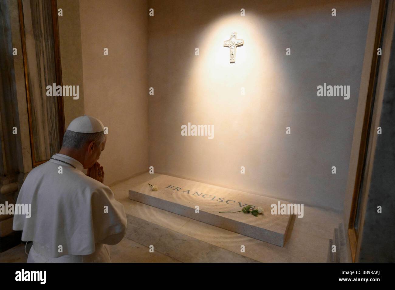 Pope Leo XIV prays on the tomb of late Pope Francis in St. Mary Major Basilica in Rome, where he ...