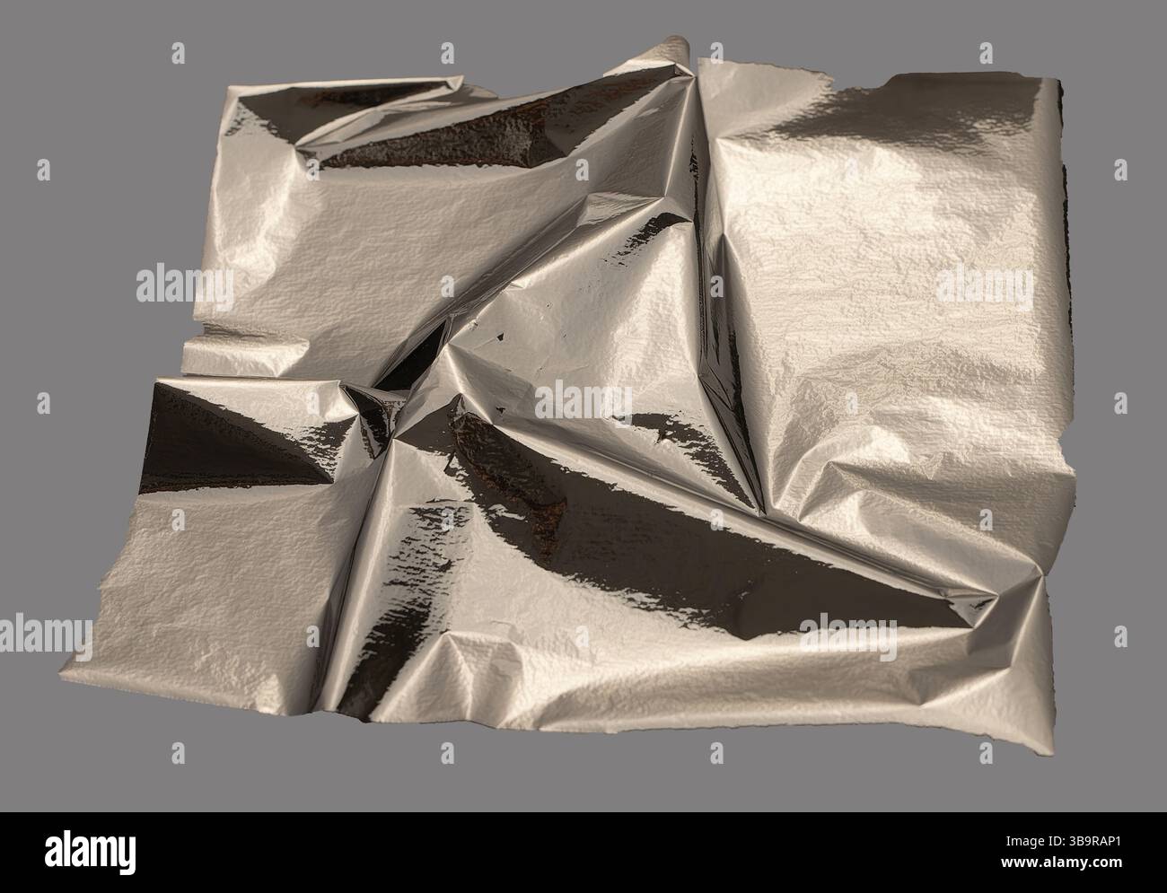 Silver foil with crumpled, shiny texture creates a high-contrast ...