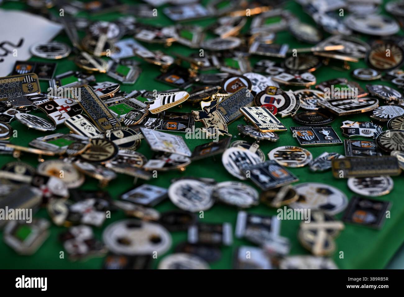 Notts County pin badges on sale outside the ground before the Sky Bet ...