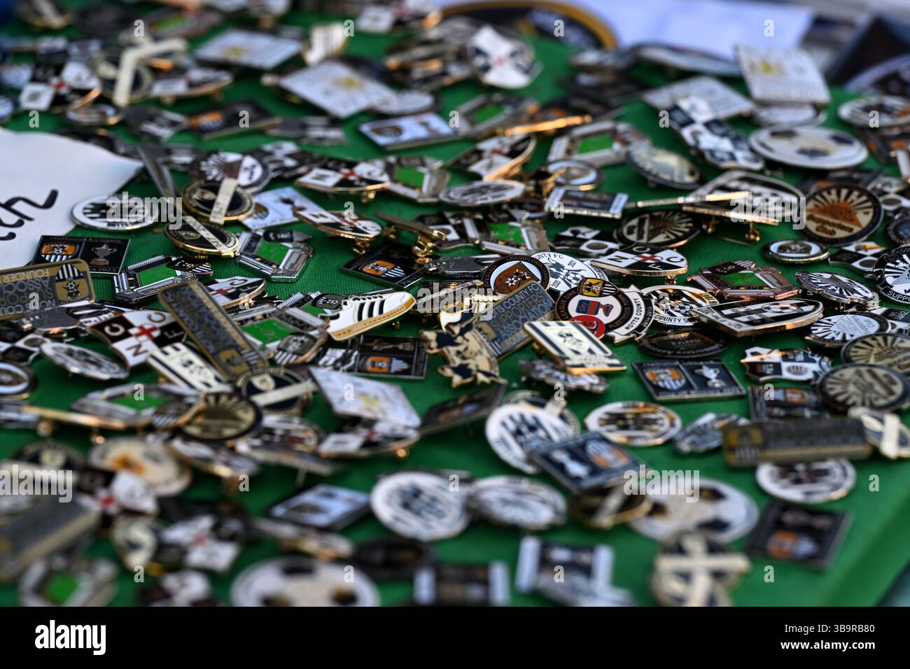 Notts County pin badges on sale outside the ground before the Sky Bet ...