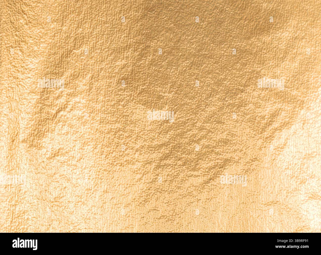Gold metallic foil background with a soft, smooth texture. Elegant ...