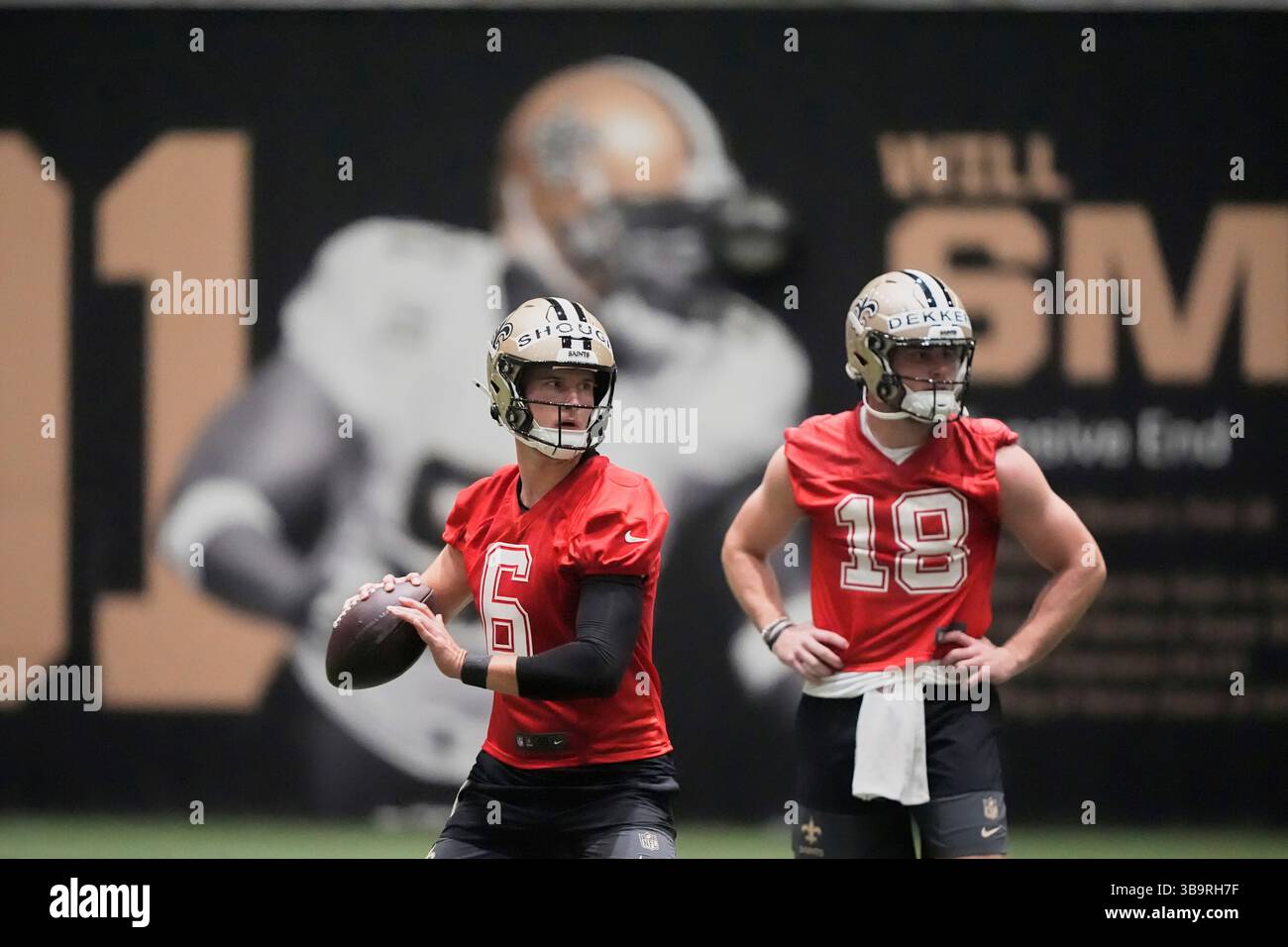 New Orleans Saints quarterbacks Tyler Shough (6) and Hunter Dekkers (18 ...