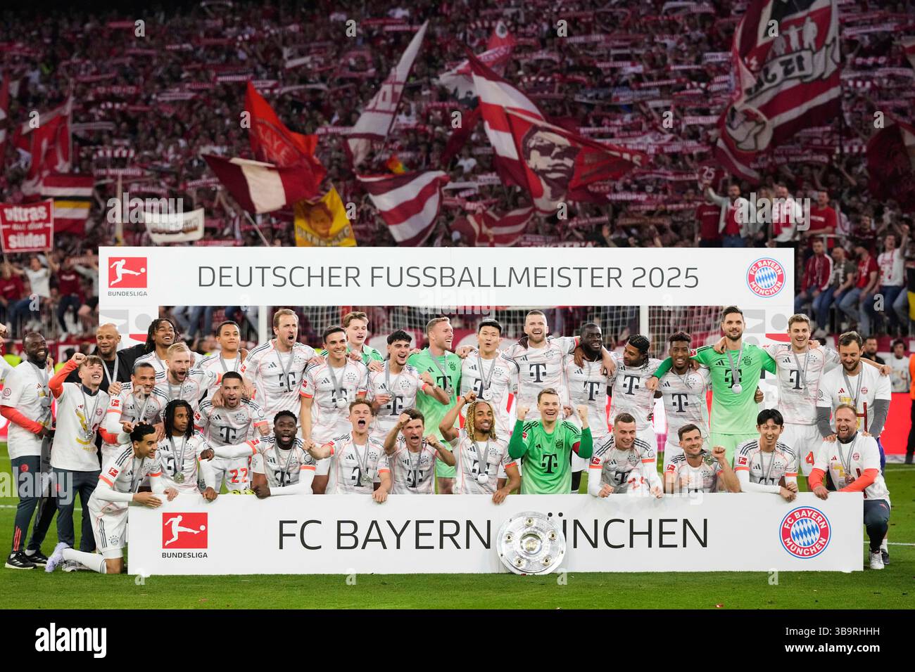 Bayern Munich players celebrate with the championship shield after the ...