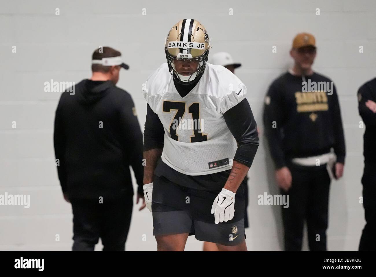 New Orleans Saints first round draft pick Kelvin Banks Jr. (71) runs ...