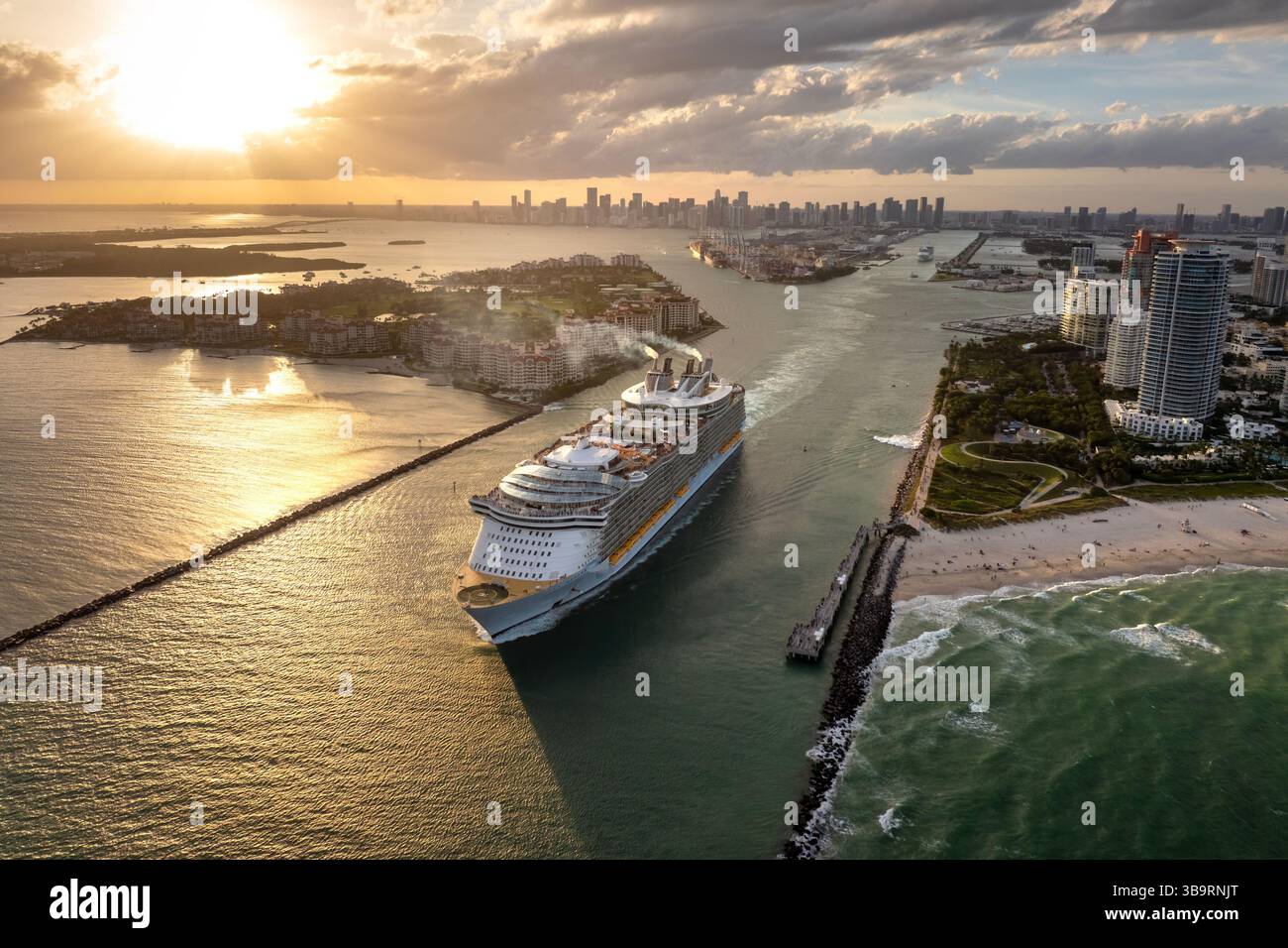 Big passenger cruise liner ship departing at main channel in Miami ...