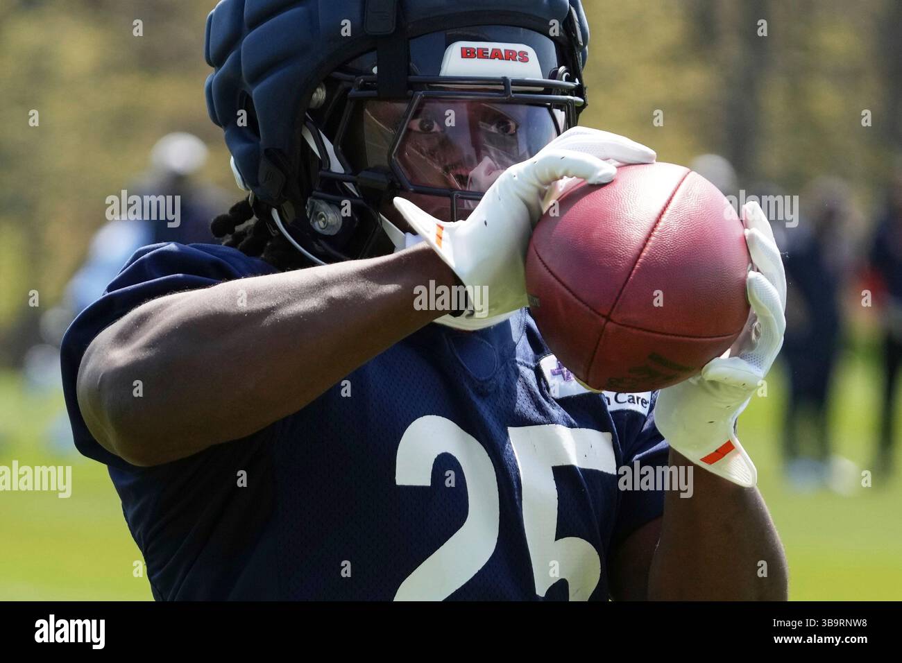 Chicago Bears running back Kyle Monangai works on the field during the ...