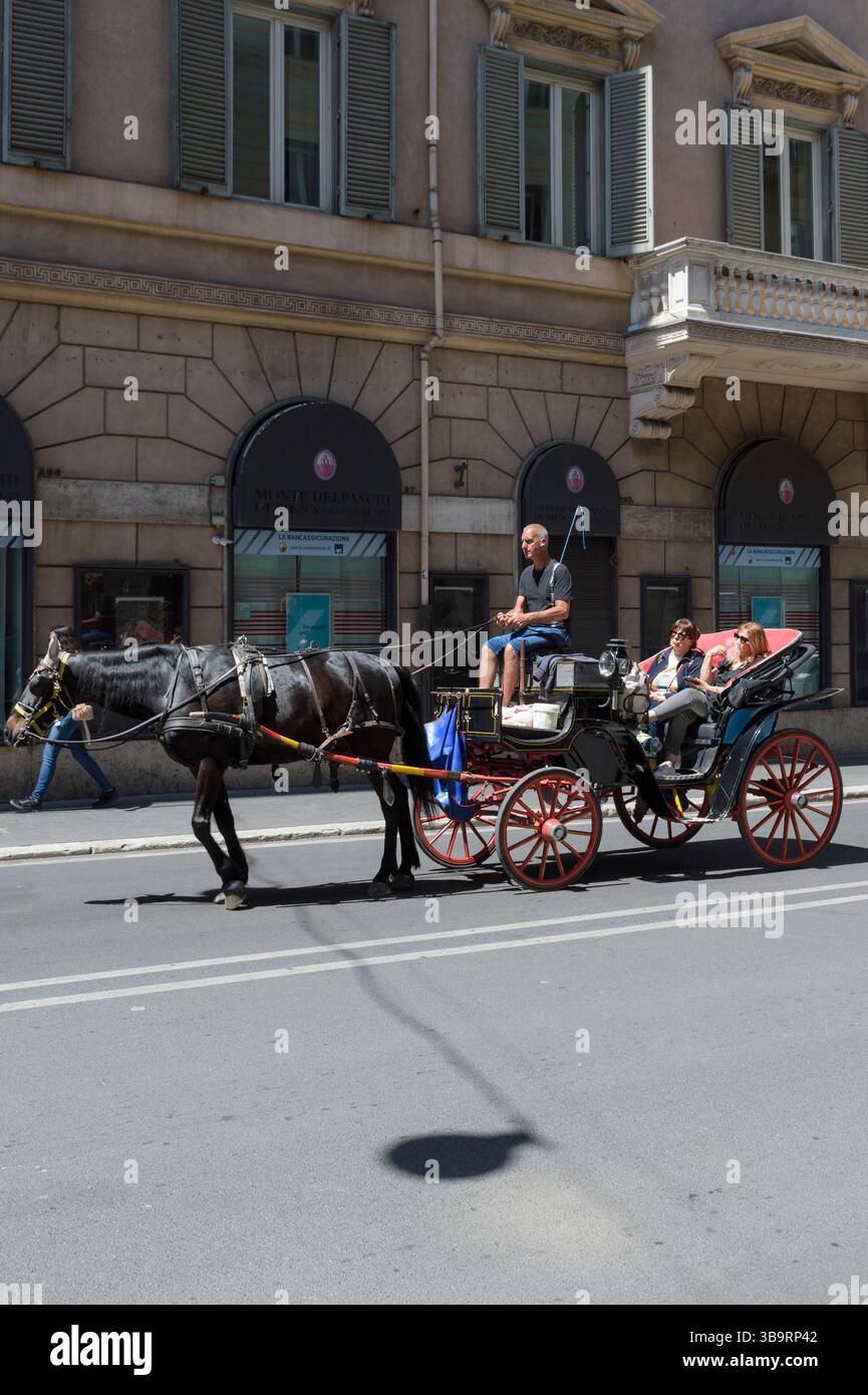 Rome, Italy. 10th May, 2025. Two tourists aboard a 'botticella ...