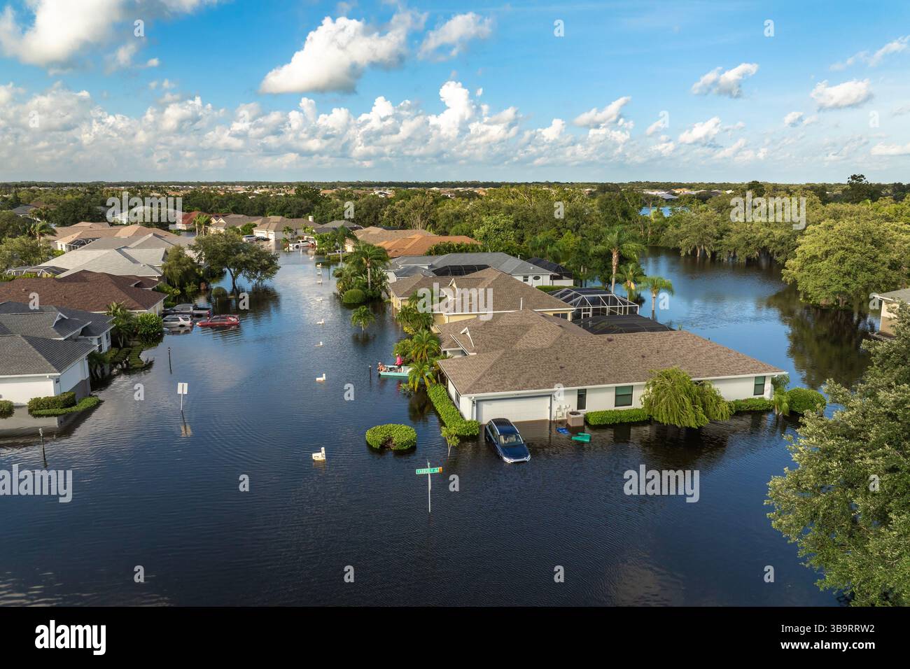 Flooded residential area with underwater cars and houses from hurricane ...