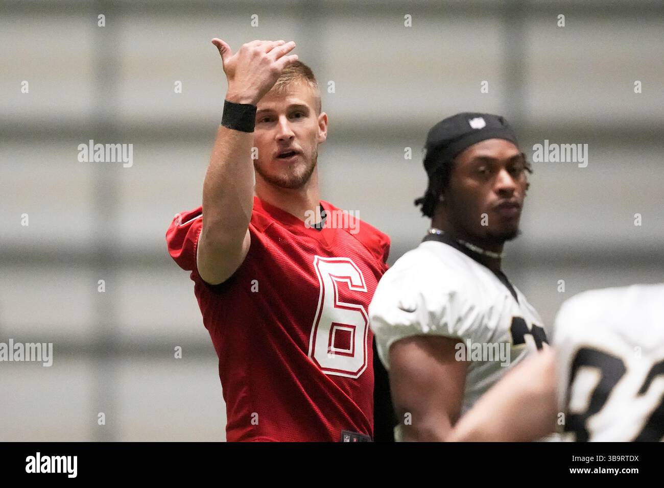 New Orleans Saints quarterback Tyler Shough (6) runs through drills ...