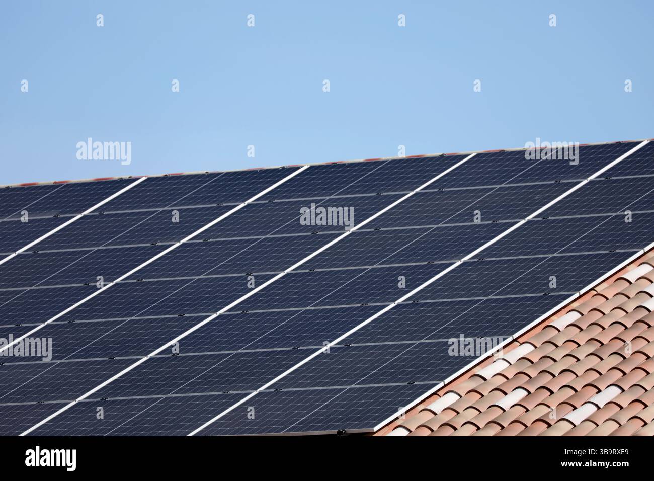 Solar panel installed on a roof Stock Photo - Alamy