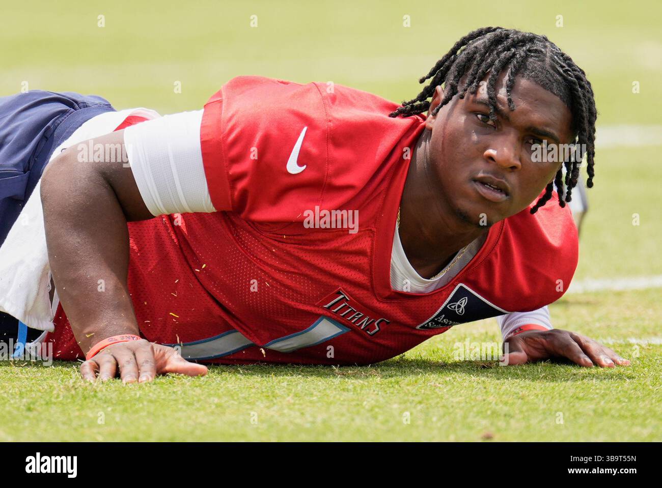 Tennessee Titans quarterback Cam Ward warms up during the NFL football team's rookie minicamp ...