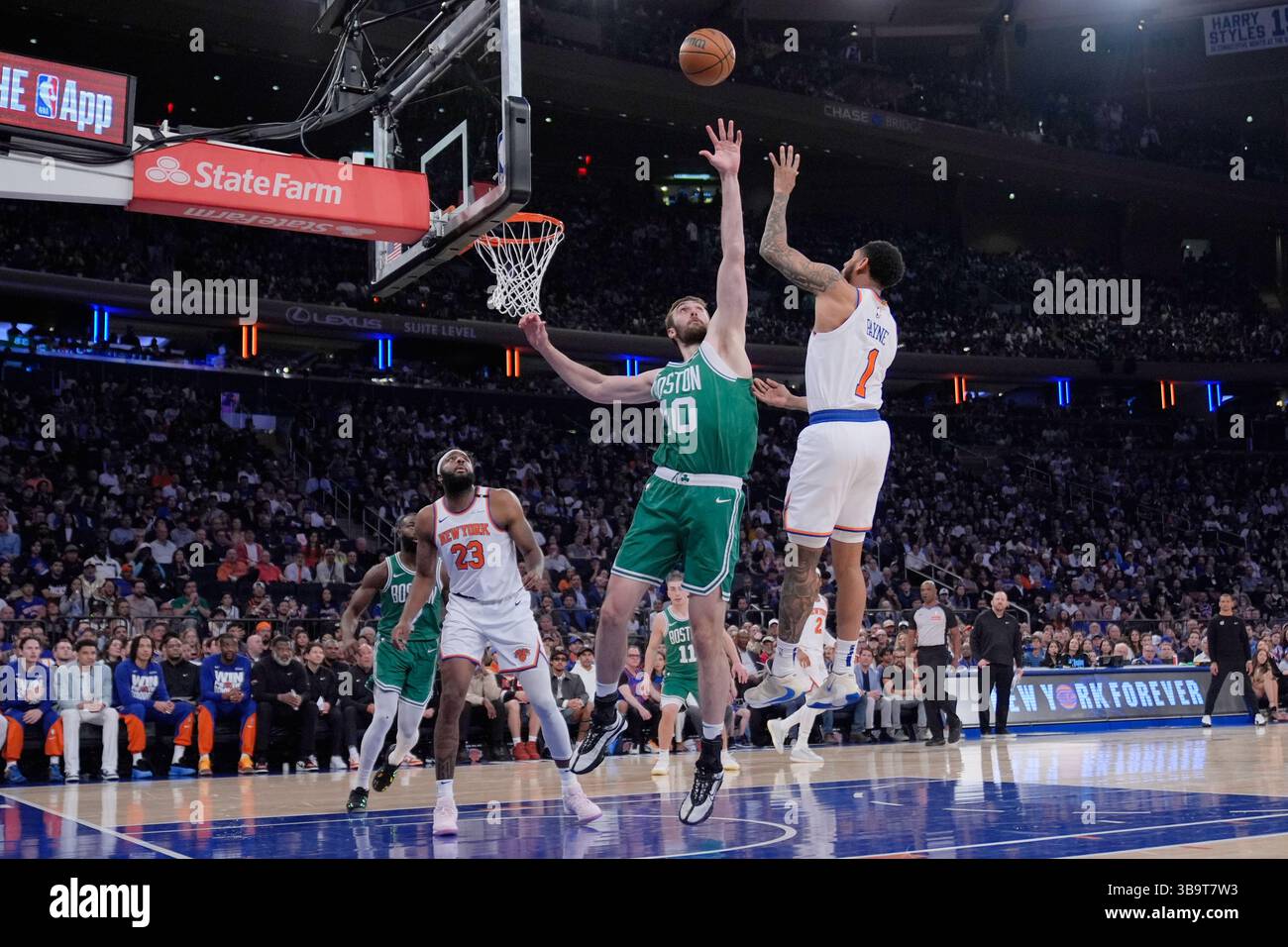 New York Knicks' Cameron Payne, right, shoots over Boston Celtics' Luke ...