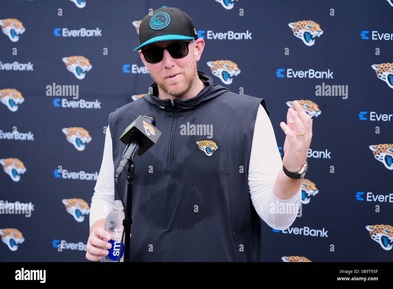 Jacksonville Jaguars head coach Liam Coen talks with reporters after ...