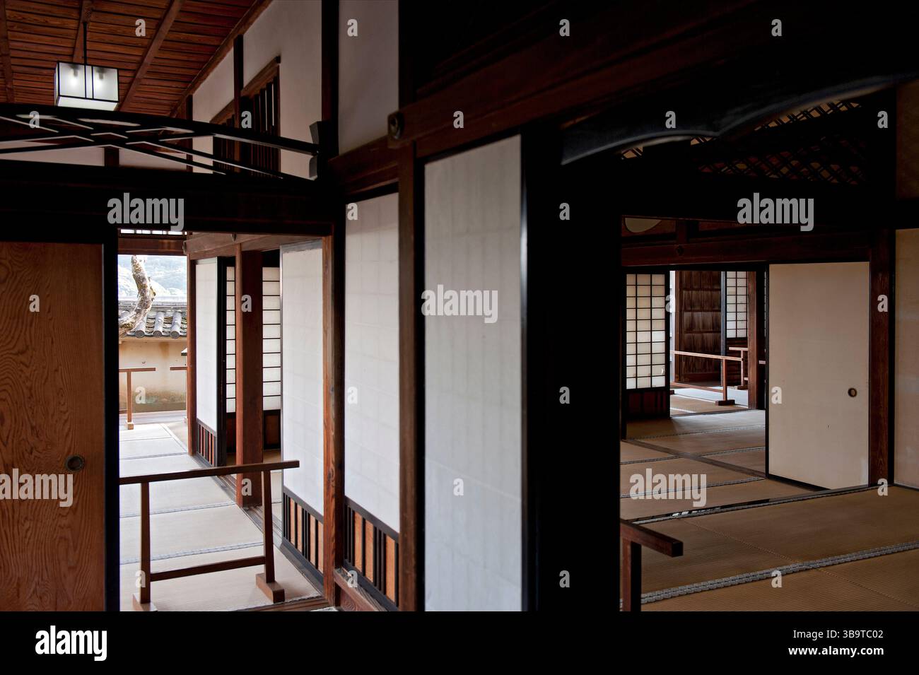 Architectural details of sliding fusuma wall panels and paper shoji screens on the interior of ...