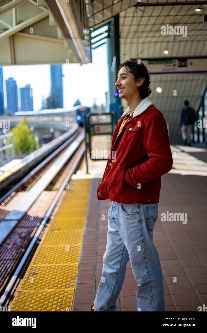 Mr. Pablo waiting for the train at the station with a big smile Stock ...