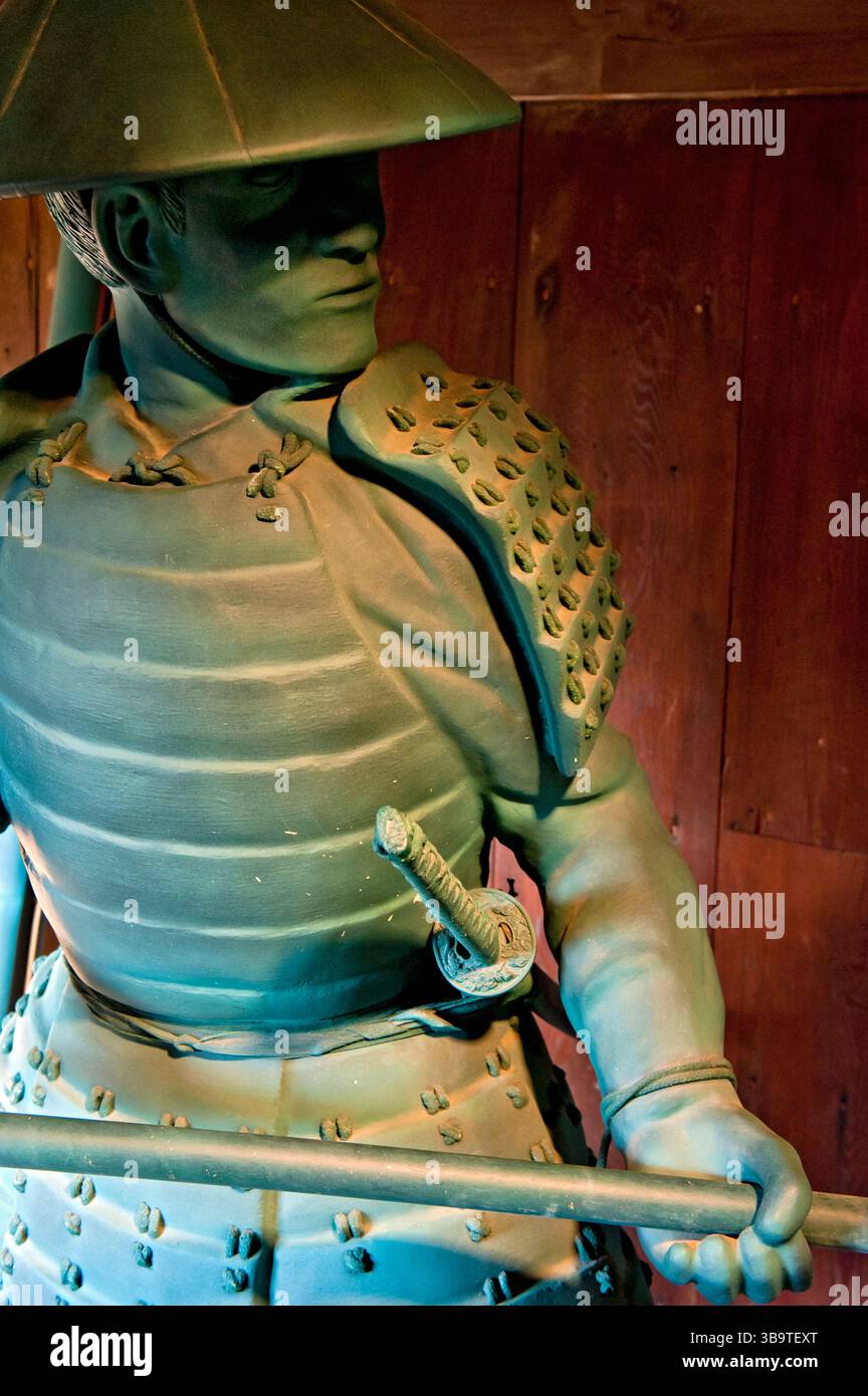 Bronze statue of a historic castle defender soldier wearing armor ...