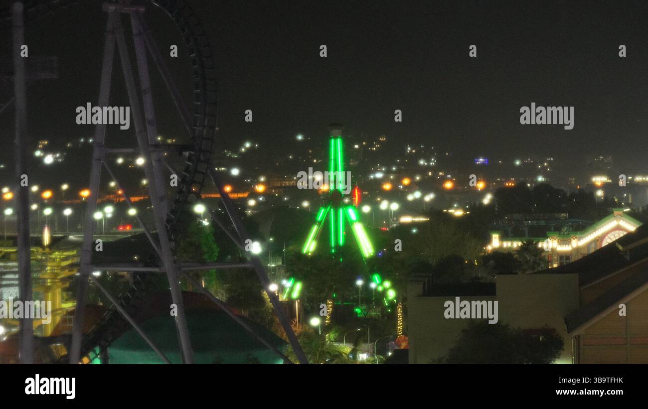 Night Fair Ride Lights Illumination: Aerial view nighttime amusement ...