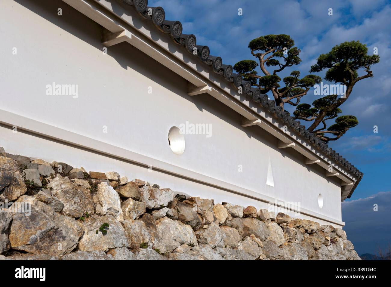 Round and triangular shaped weapon portals (武者窓) in the wall of Kochi ...
