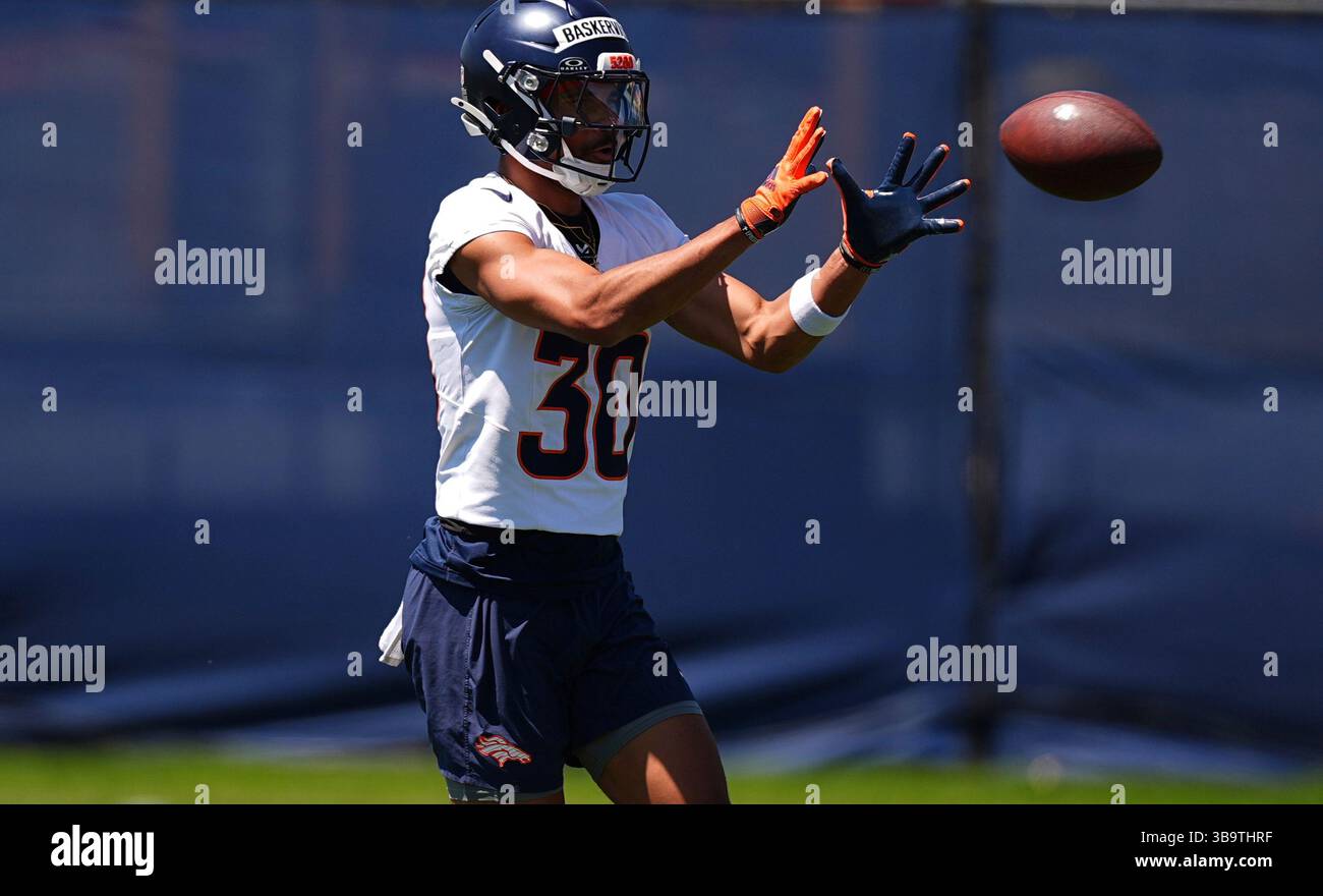 Denver Broncos safety C.J. Baskerville takes part in drills during the ...