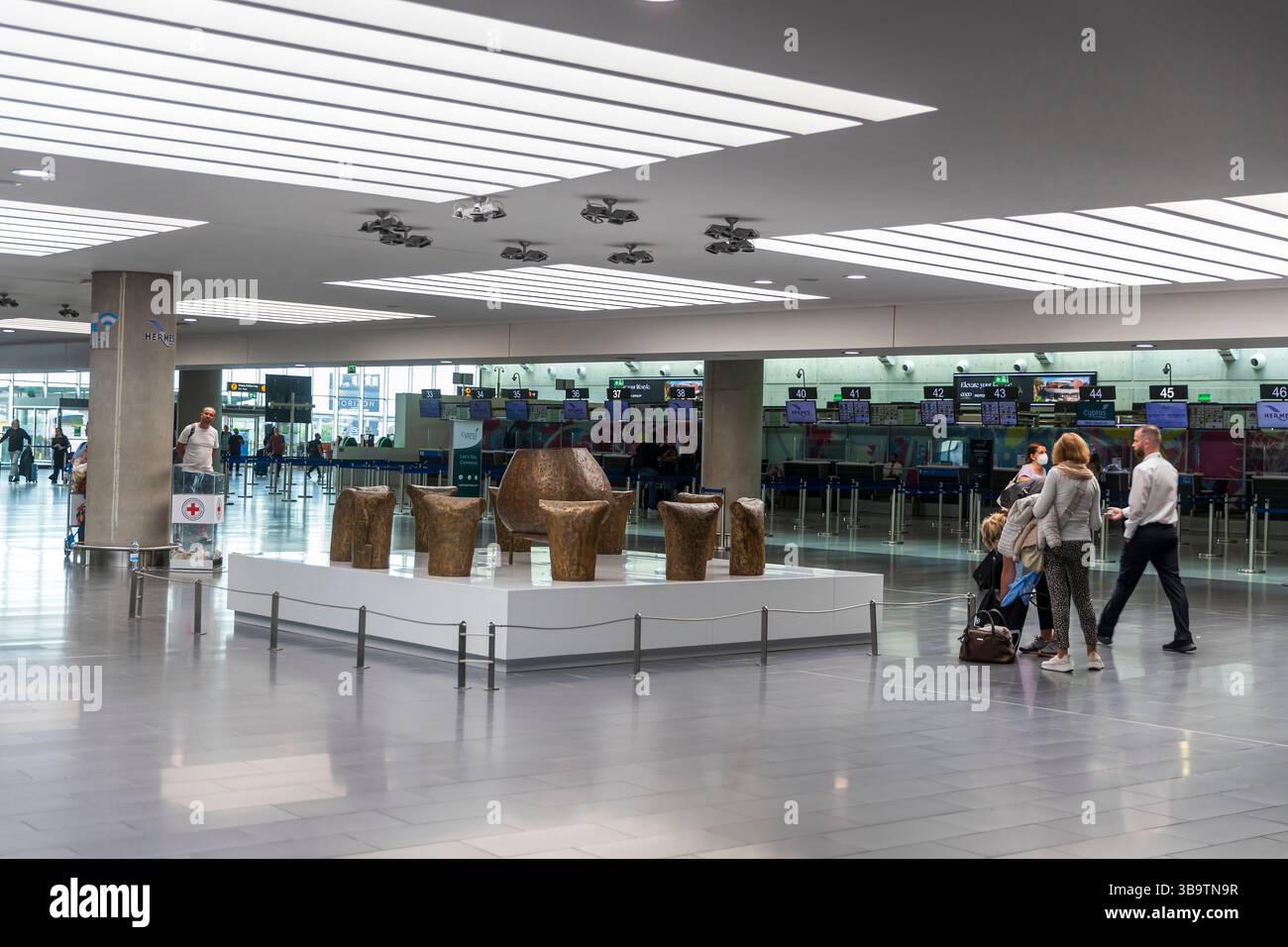 Larnaca, Cyprus, 8 May 2025, Travelers walk through the modern terminal ...