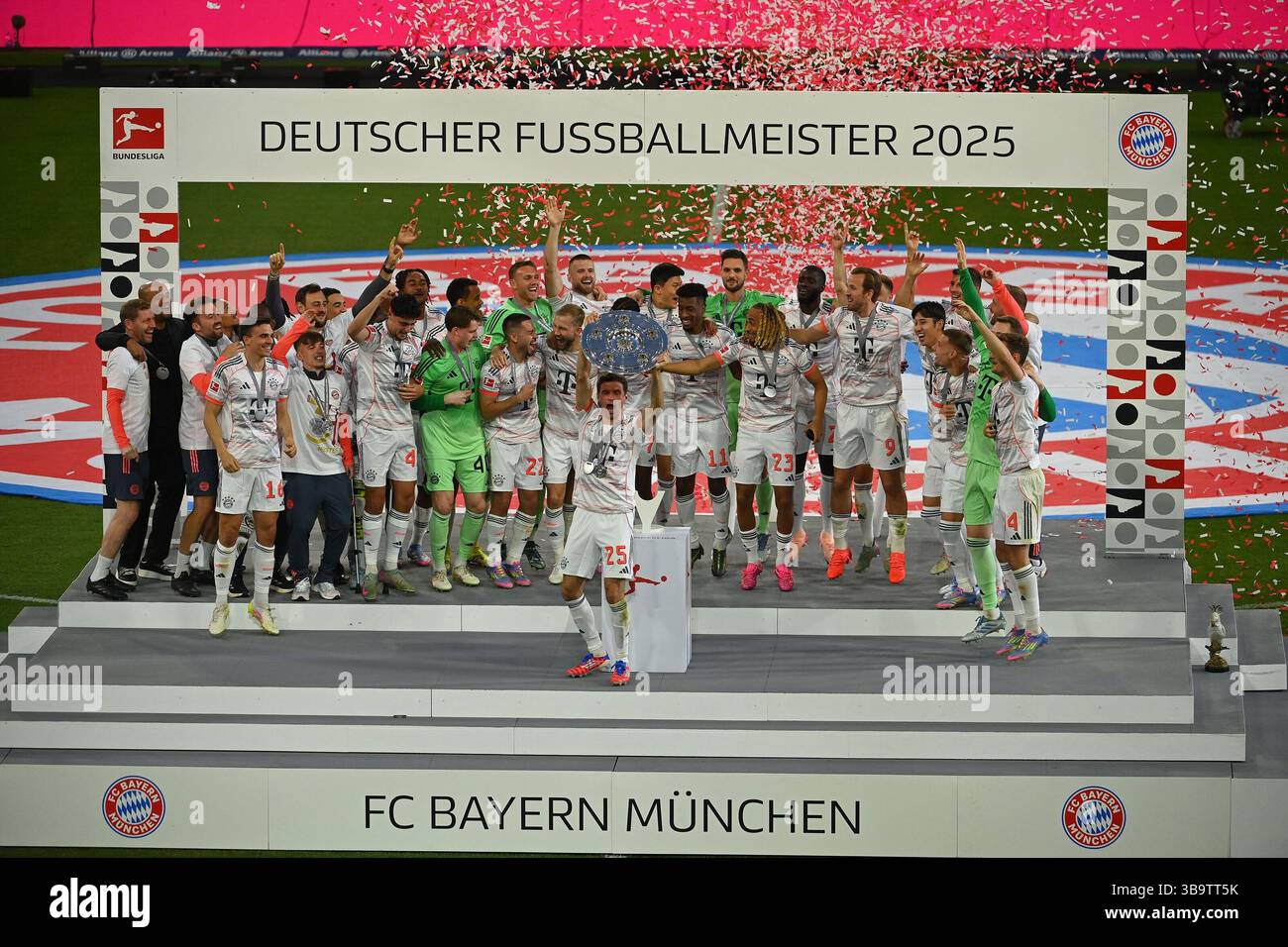 Munich, Deutschland. 10th May, 2025. Thomas MUELLER (M?LLER, FC Bayern Munich) with the trophy ...