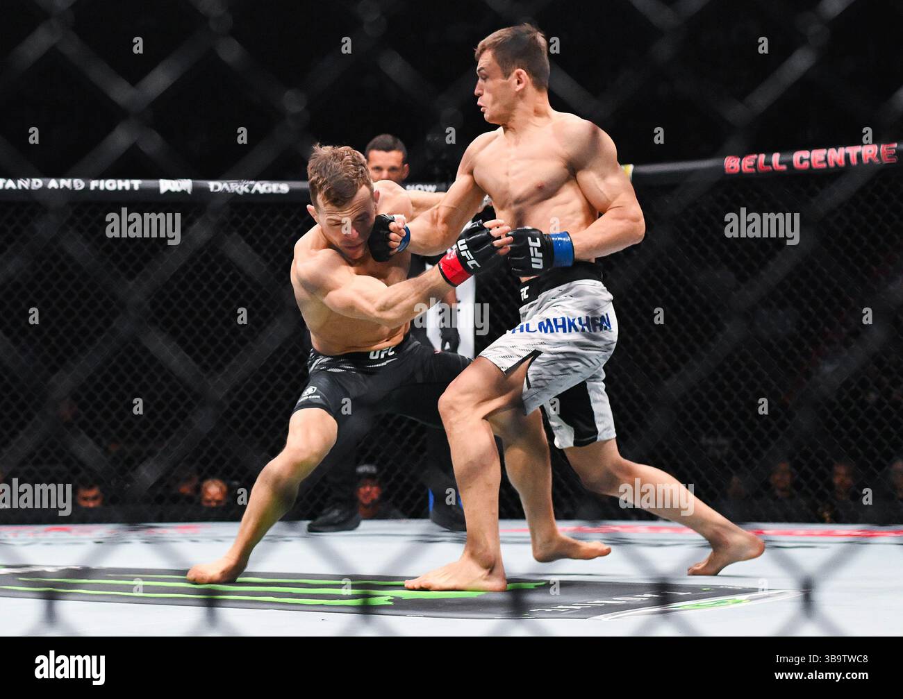 Montreal, Canada. 10th May, 2025. Bekzat Almakhan, right, lands a punch ...