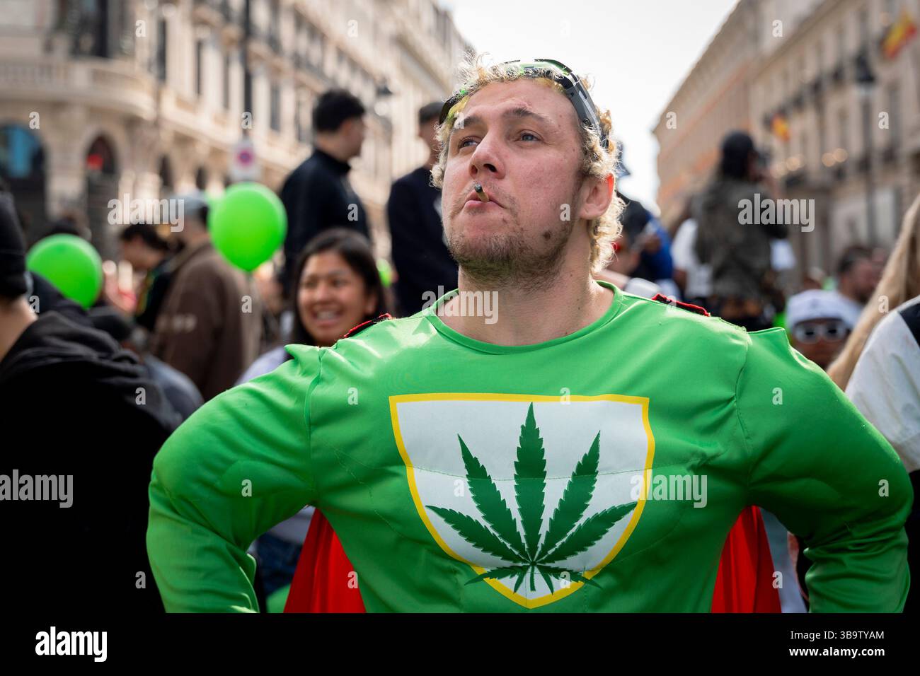 A man smoking dressed as the superhero Marijuana during the Global ...
