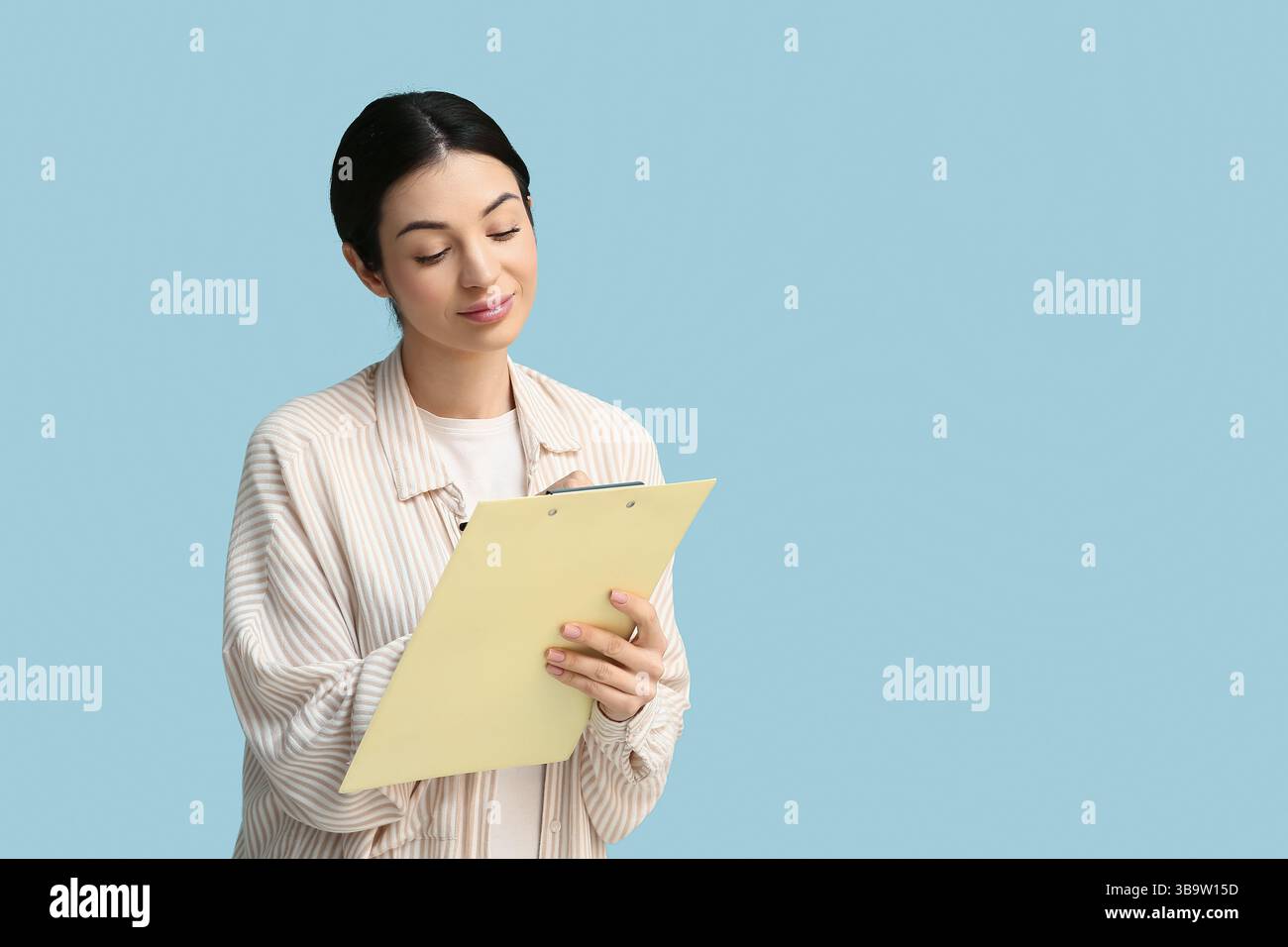 Female inventor writing on hi-res stock photography and images - Alamy