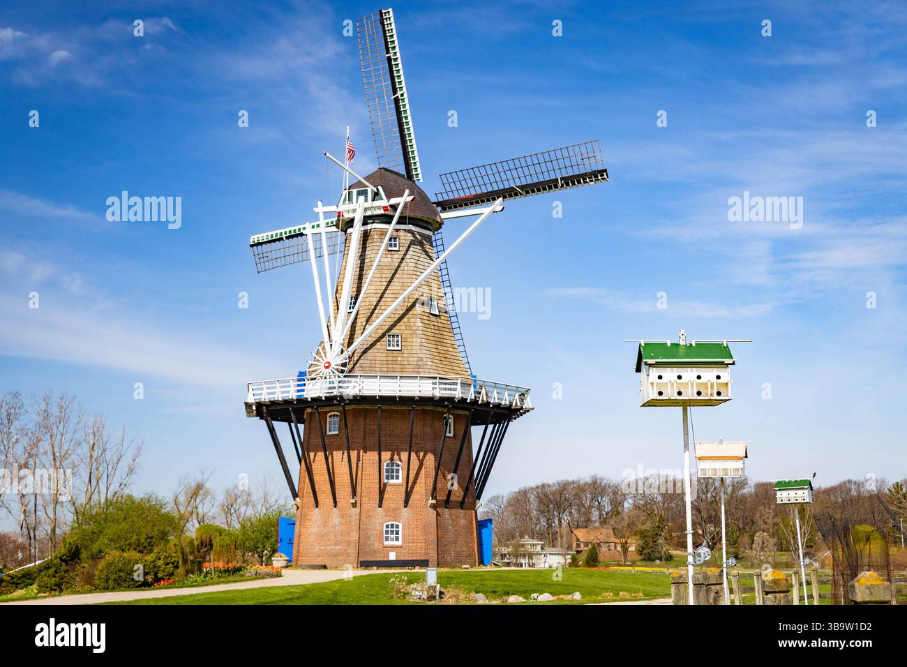 Photo of real Dutch windmill next to birdhouse at Windmill Island ...