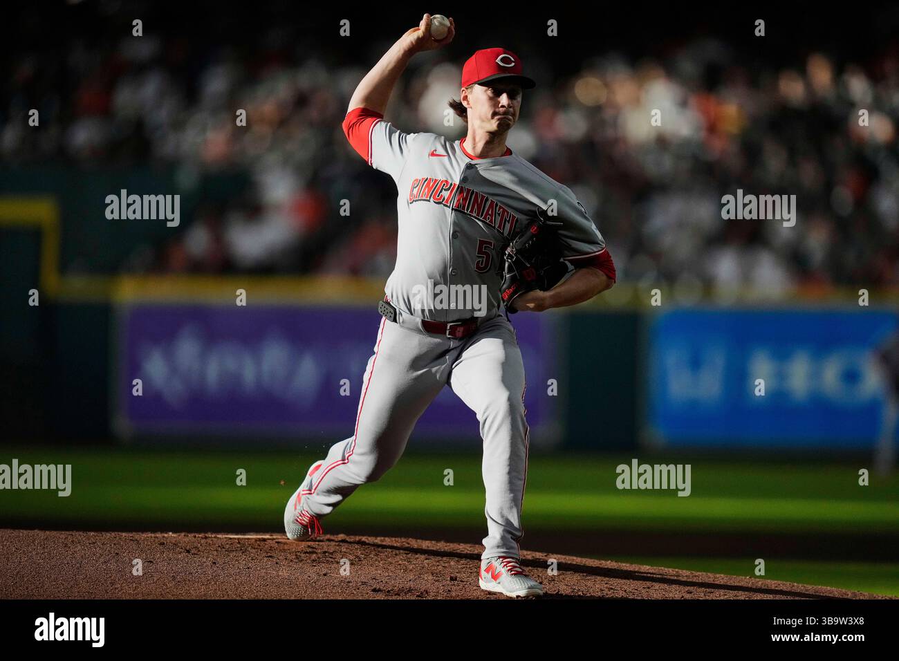 Cincinnati Reds starting pitcher Brady Singer throws during the first ...
