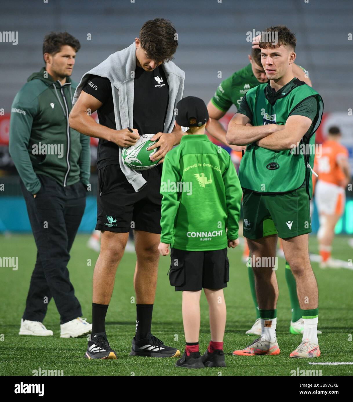 Galway, Ireland. 10th May, 2025. Connacht's Chay Mullins signs a rugby ...