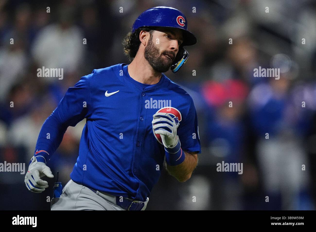 Chicago Cubs' Dansby Swanson runs the bases after hitting a home run during the fourth inning of ...