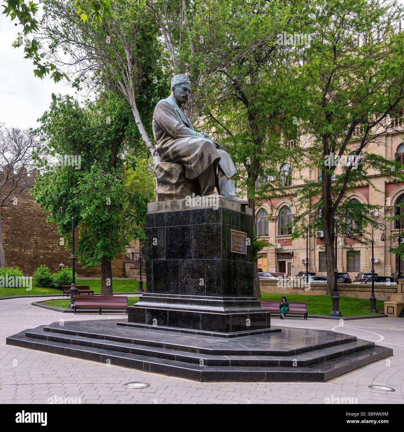 Baku, Azerbaijan - May 5, 2024: A bronze statue of Mirza Alakbar Sabir ...
