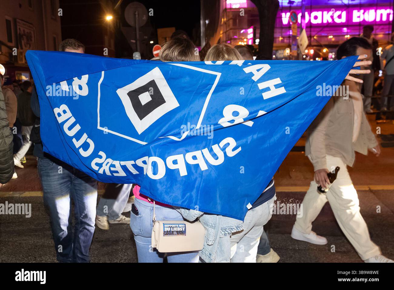 Hamburg, Germany. 11th May, 2025. Fans of Hamburger SV (HSV) celebrate ...