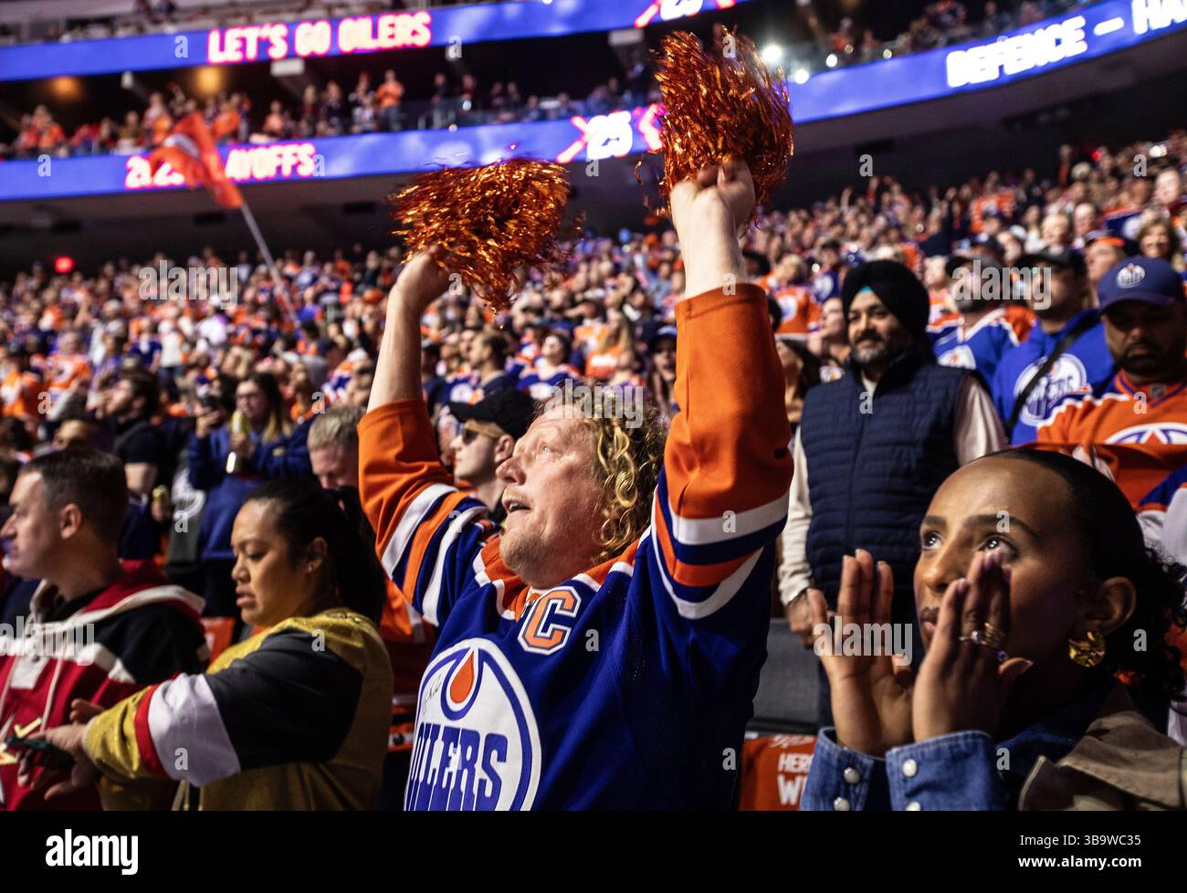 Fans cheer as the Vegas Golden Knights and the Edmonton Oilers take to ...