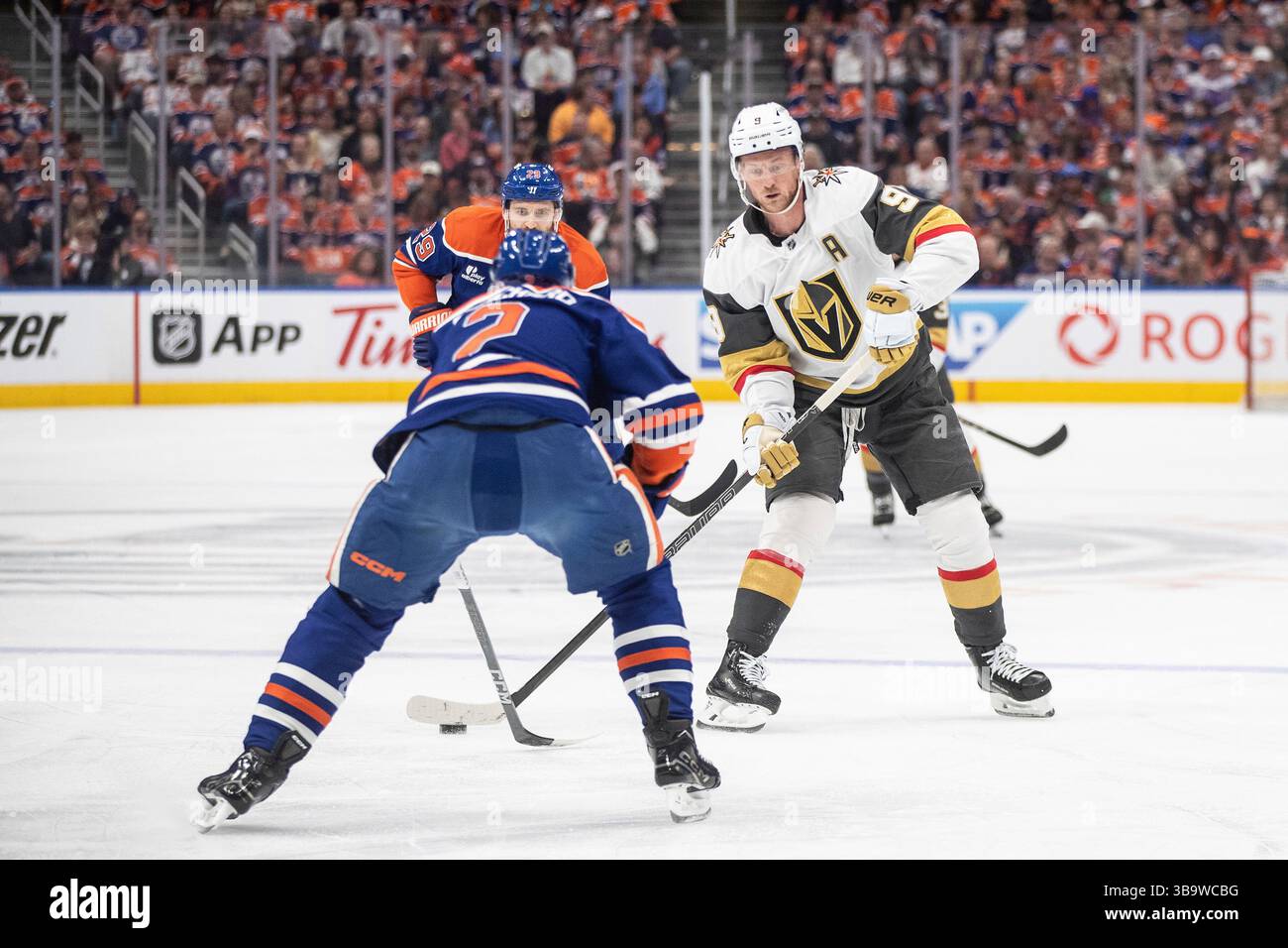 Vegas Golden Knights' Jack Eichel (9) tries to get past Edmonton Oilers ...