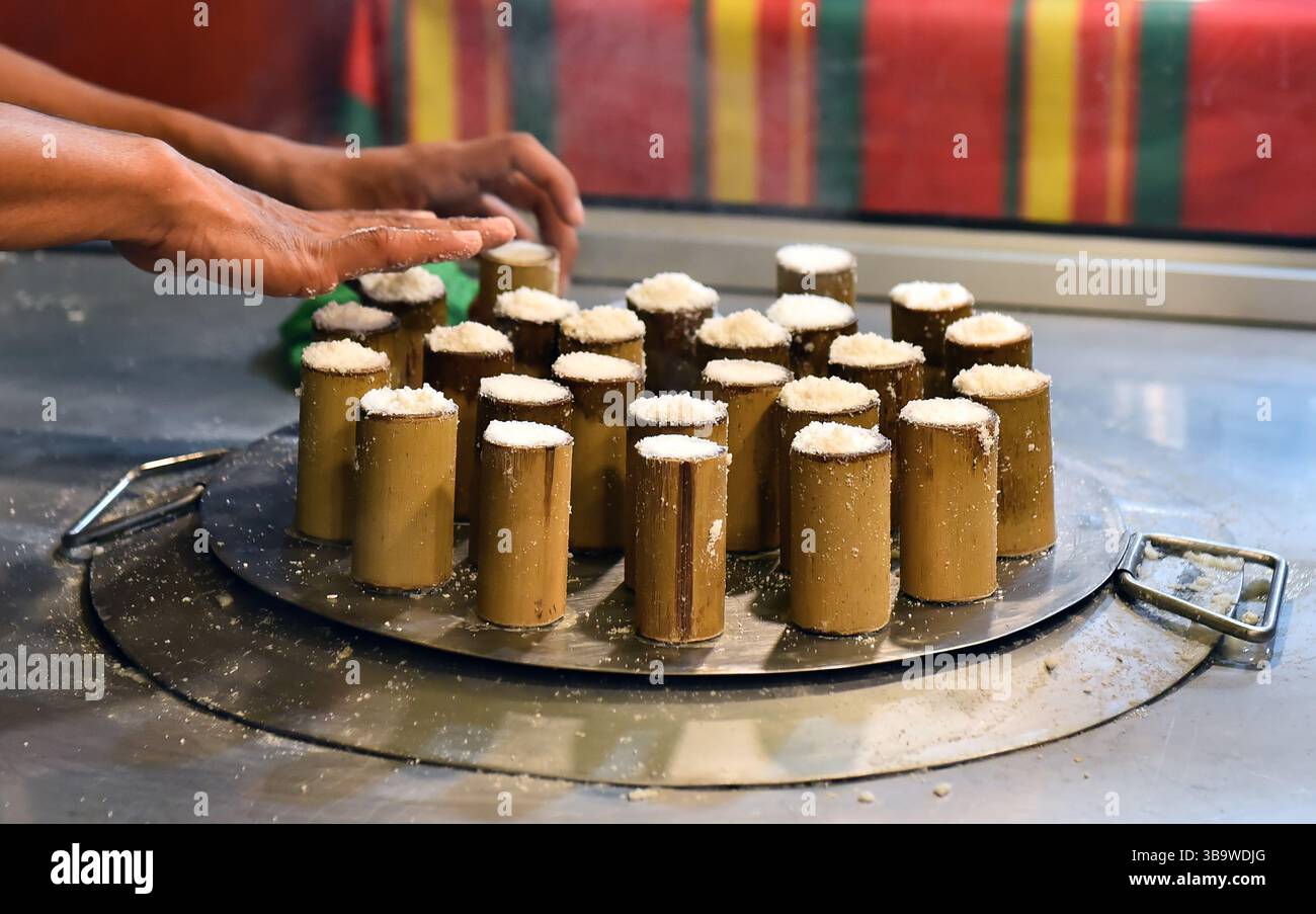 Traditional Malaysian Putu Buluh Steamed in Bamboo Tubes - This image ...
