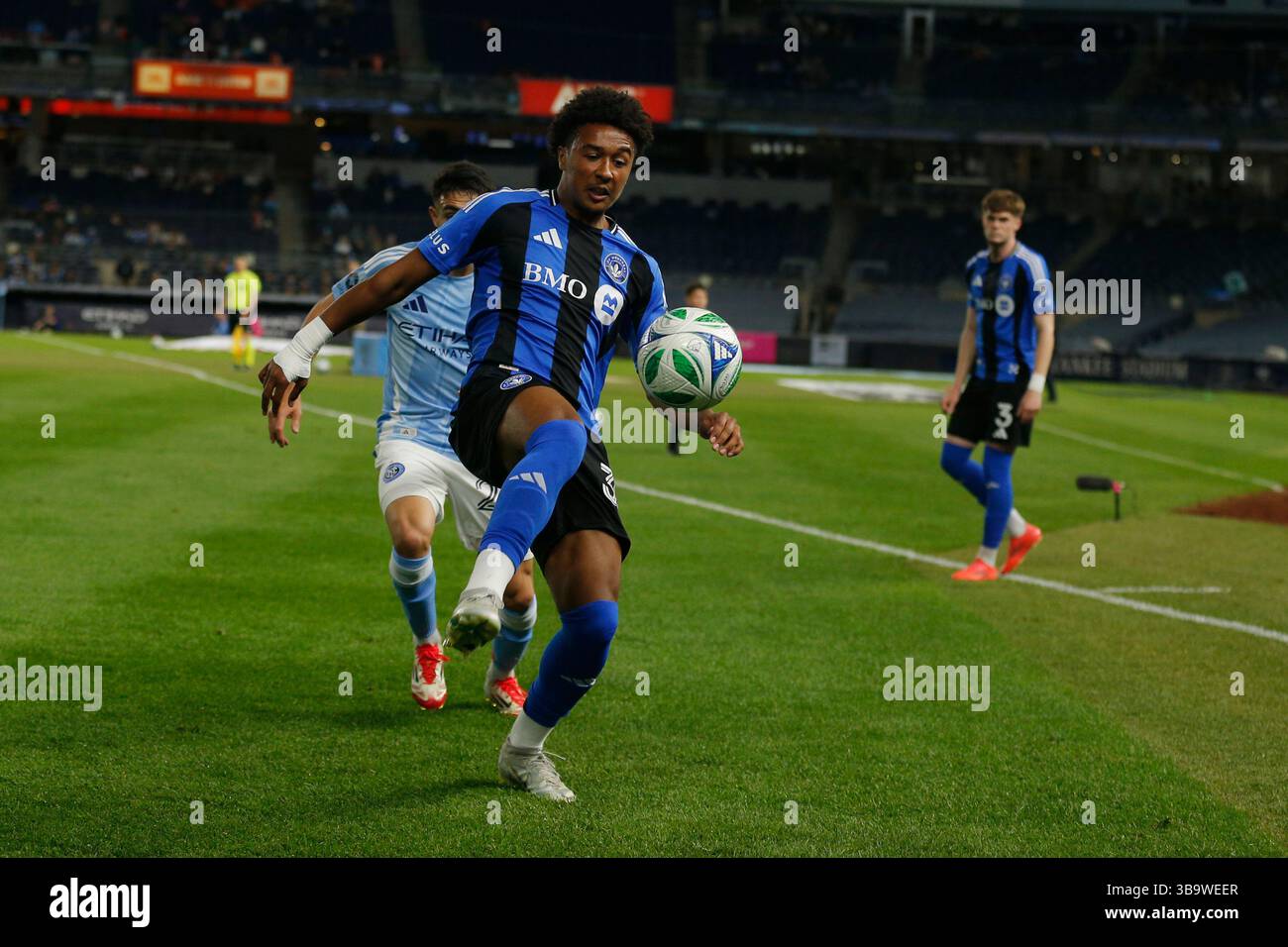 CF Montreal's Owen Graham-Roache, front, controls the ball while ...