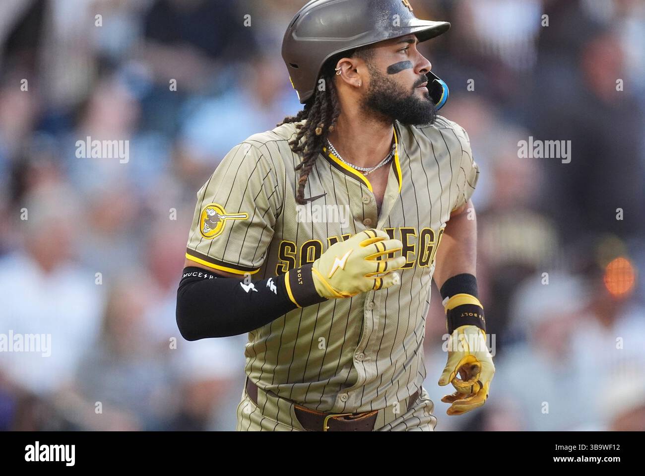 San Diego Padres' Fernando Tatis Jr. heads up the first base line after ...
