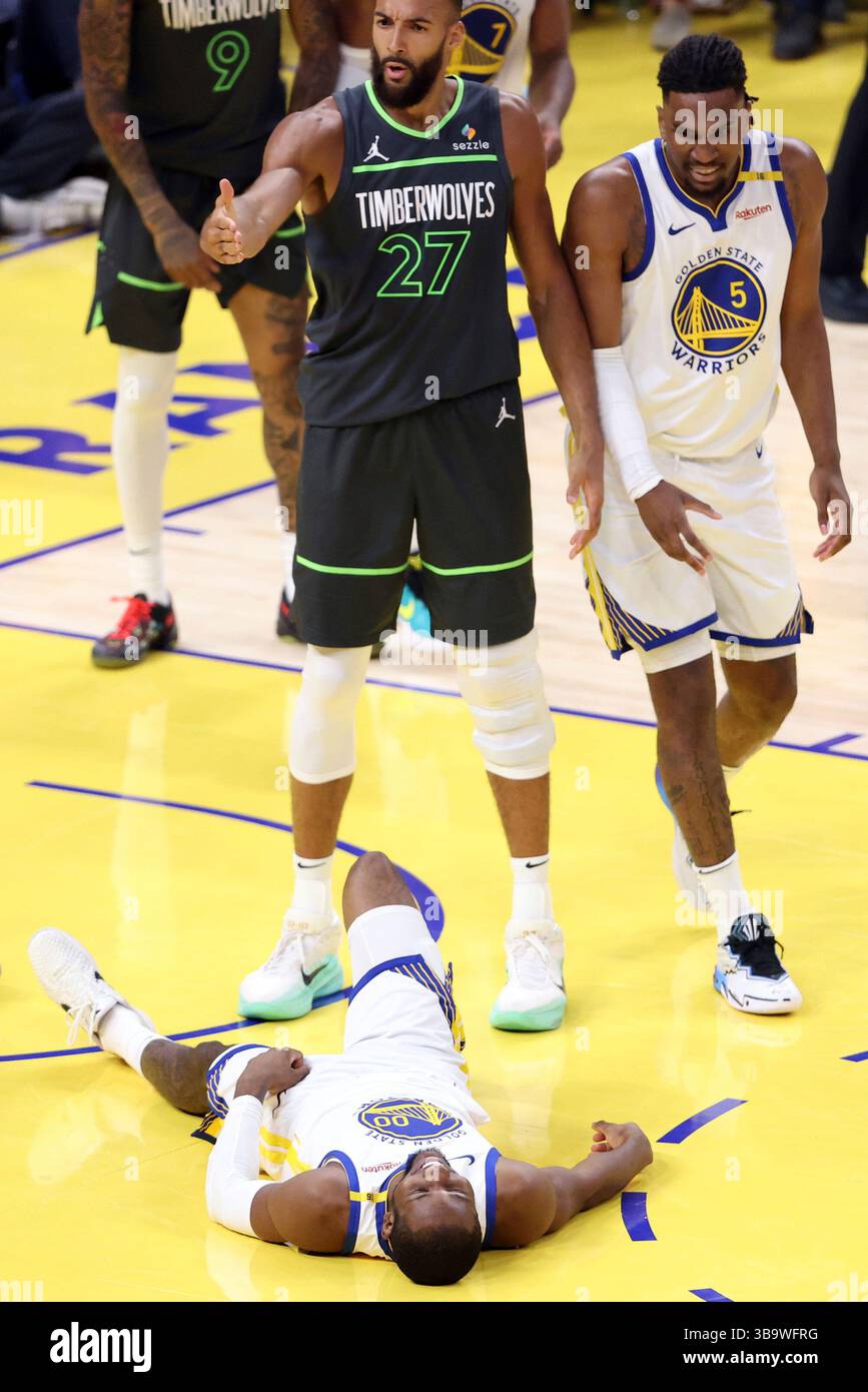 Golden State Warriors' Jonathan Kuminga smiles after making a basket ...
