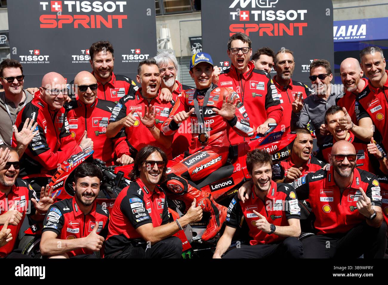 Le Mans, France. 11th May, 2025. Marc Marquez of Spain and Ducati Lenovo Team with team manager ...