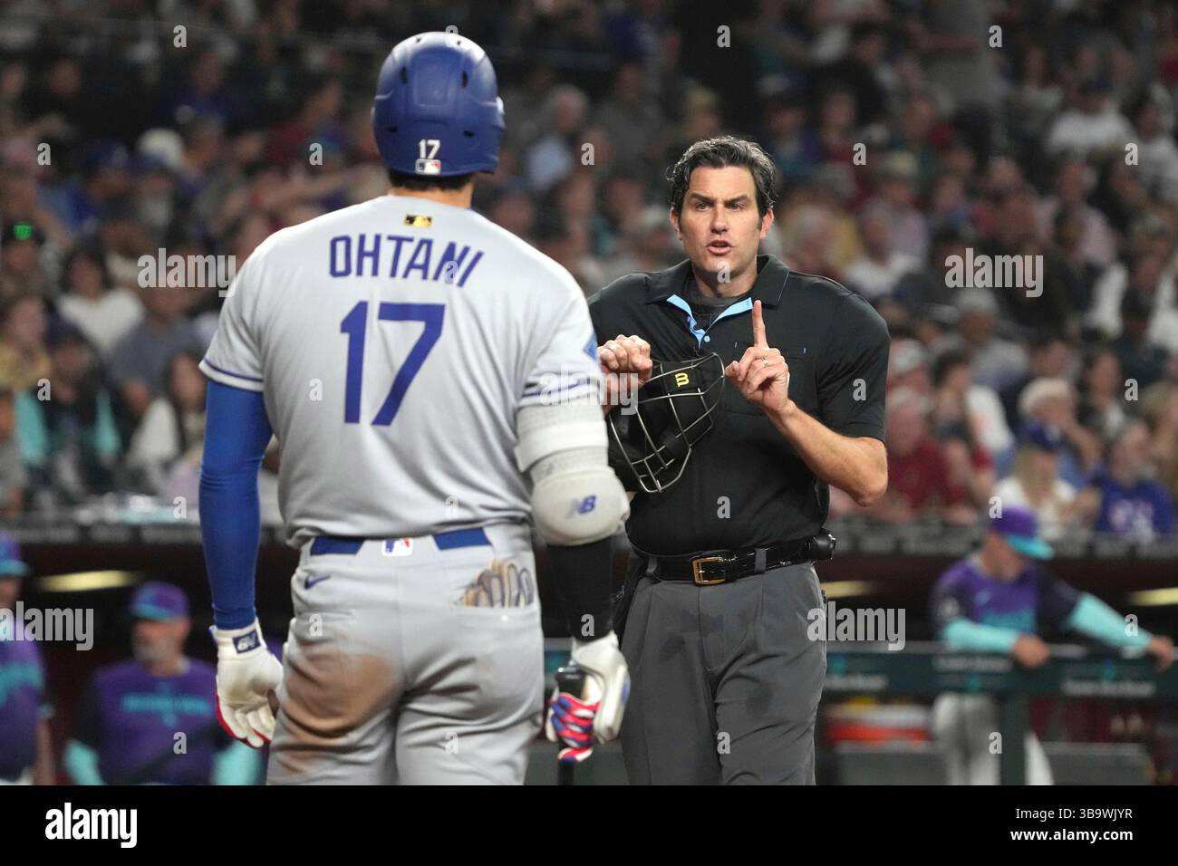 Home plate umpire John Tumpane, right, tells Los Angeles Dodgers ...