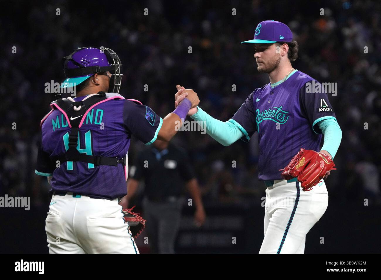 Arizona Diamondbacks catcher Gabriel Moreno (14) and pitcher Ryne ...